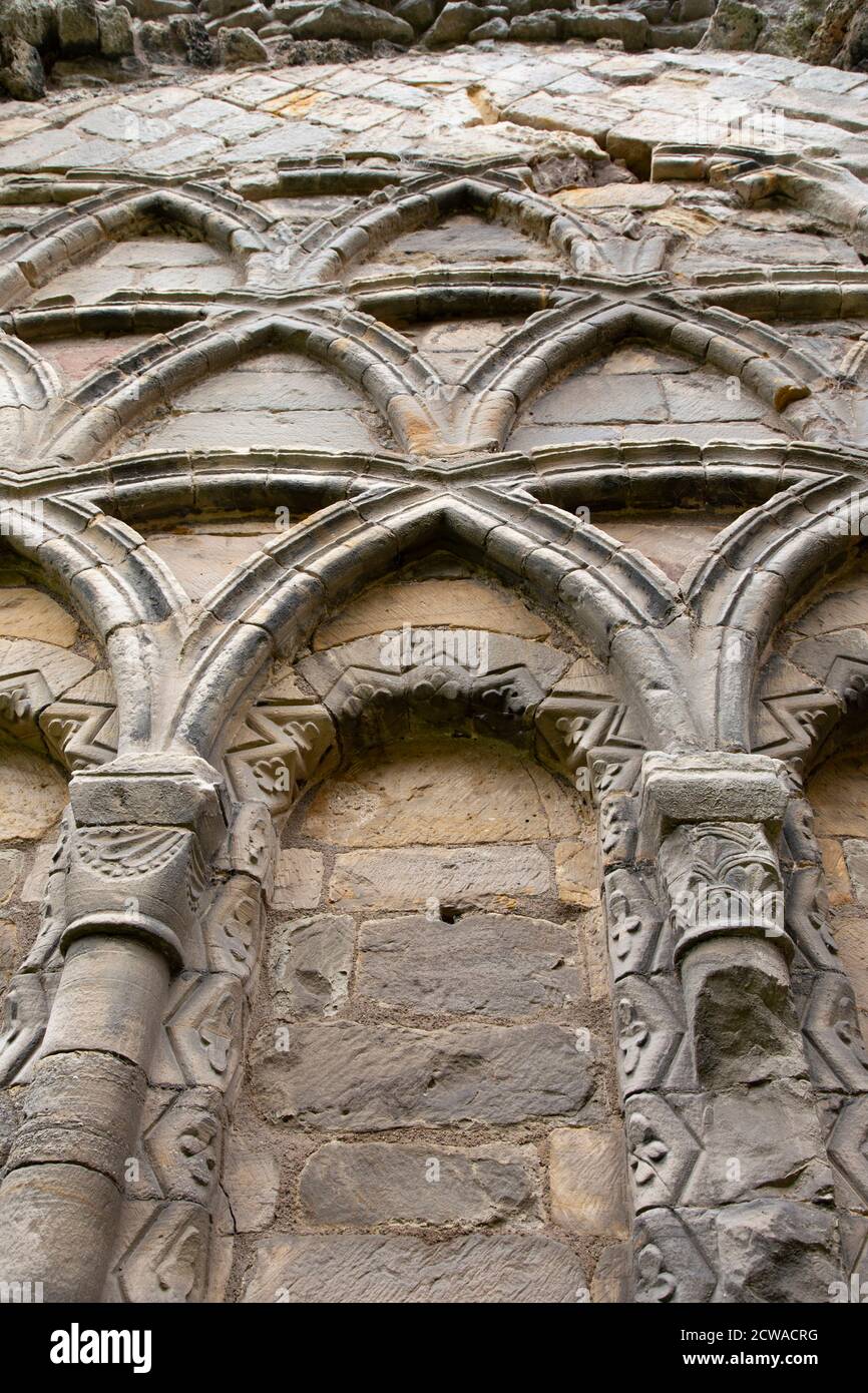 Stone carving on a wall of a medieval priory abbey Stock Photo - Alamy