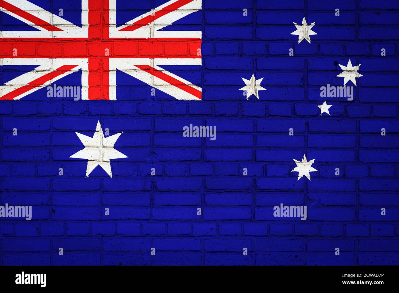 National flag of Australia depicting in paint colors on an old brick ...