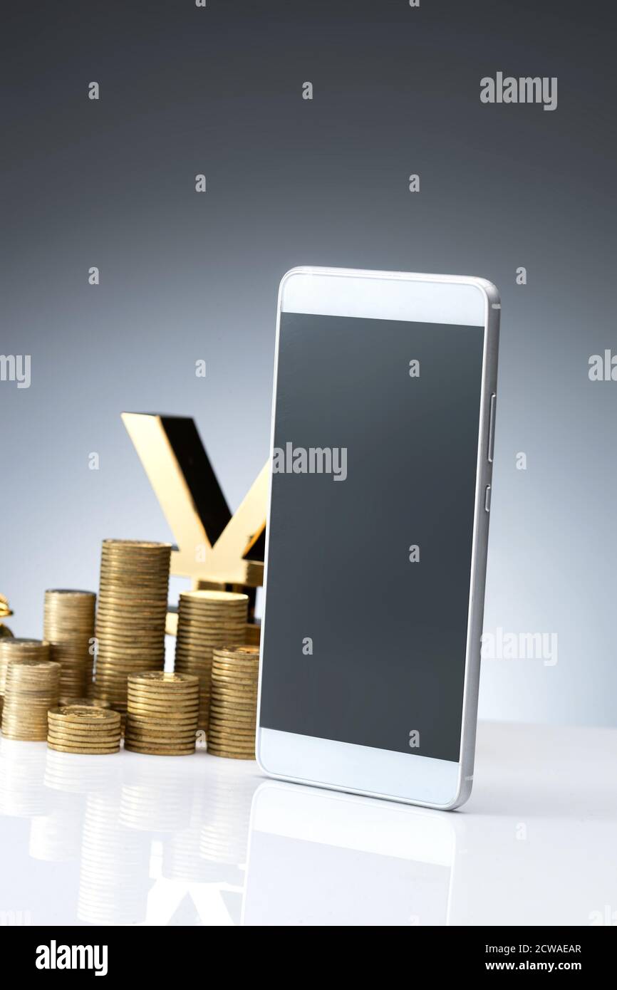 Stock market phones hi-res stock photography and images - Alamy