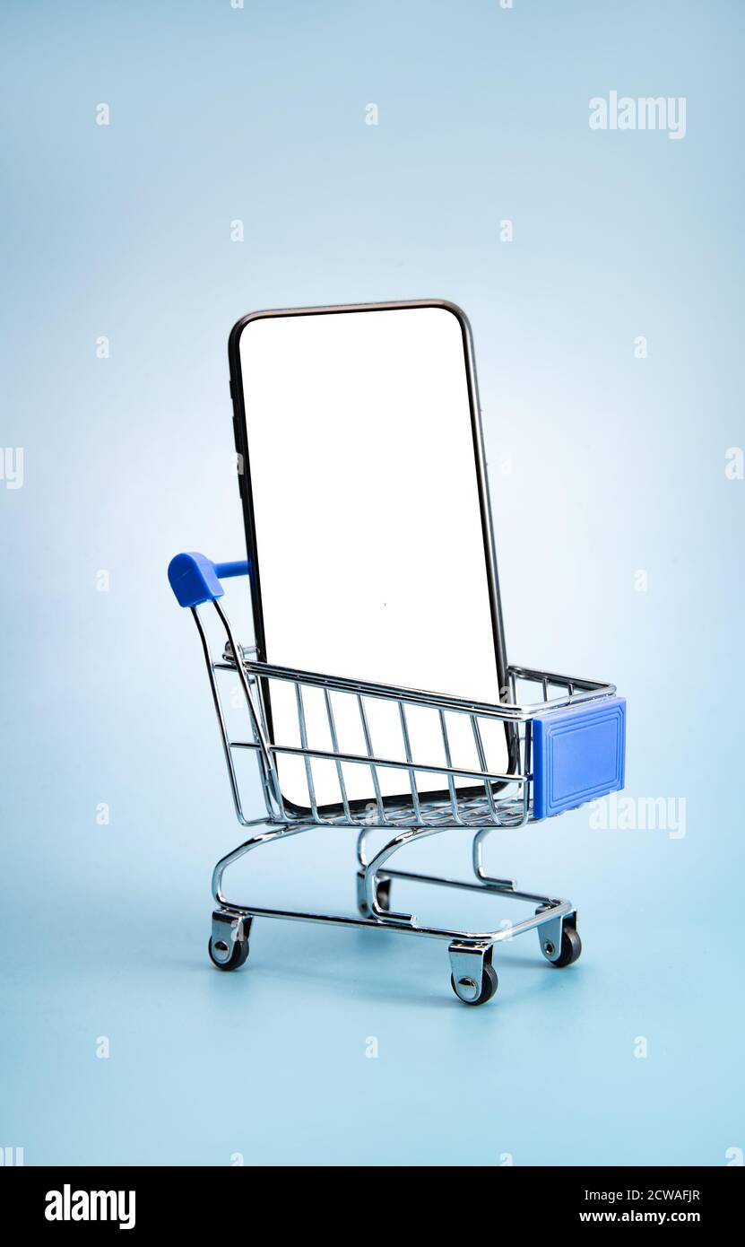 Blue shopping cart on screen hi-res stock photography and images - Alamy