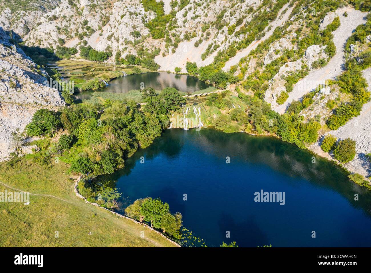 Krupa river with lake and waterfalls Stock Photo - Alamy