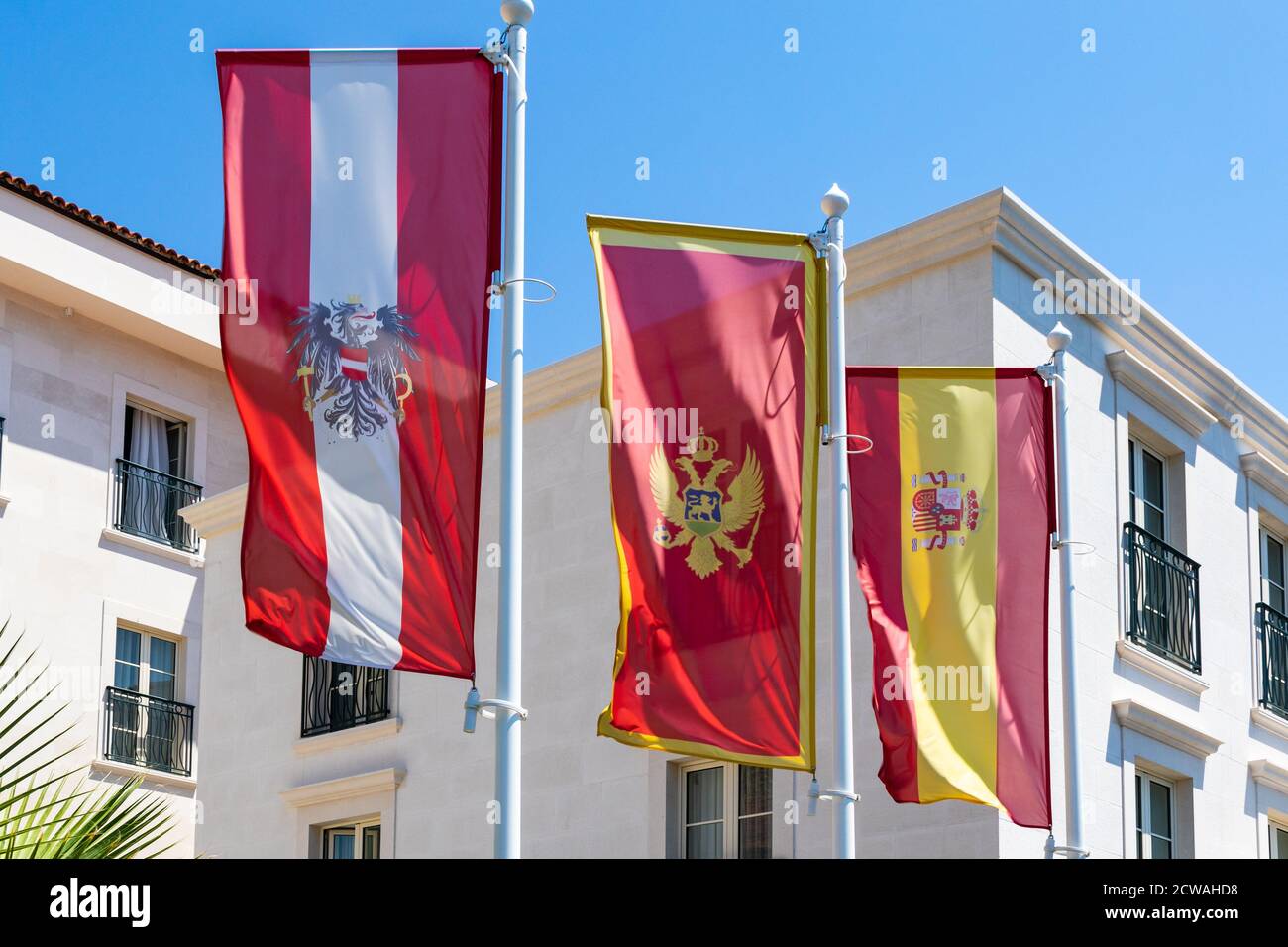 The national flags of Austria, Montenegro and Spain, flying in Perast ...