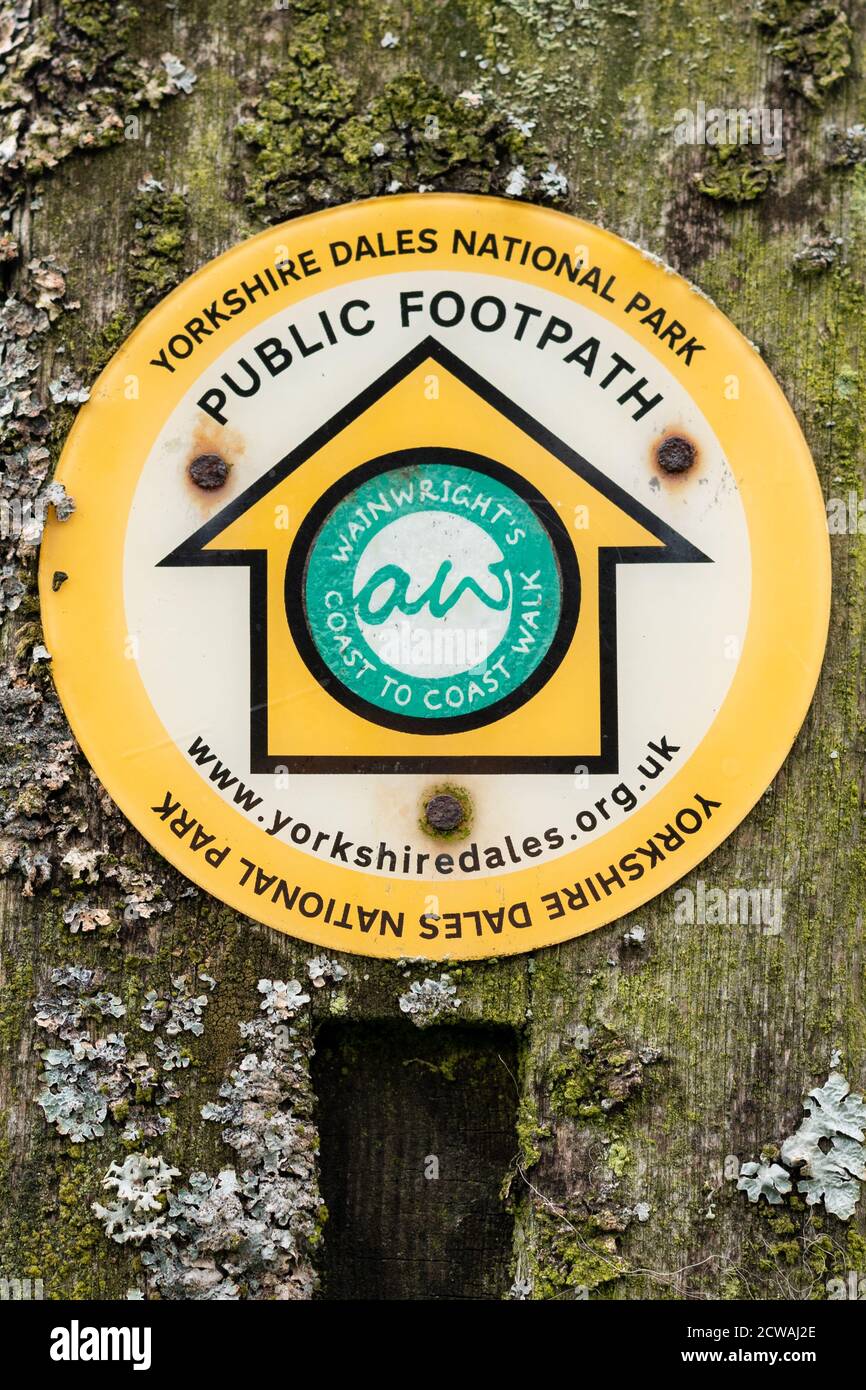 Wainwright's Coast to Coast walk footpath way marker as it passes ...