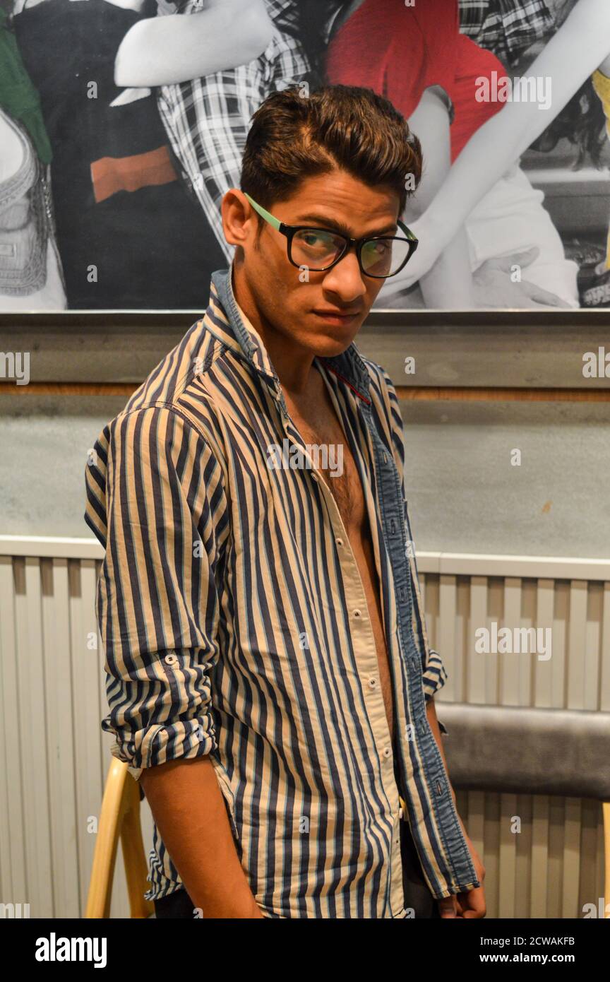 Indian boys giving poses for fashion photo shoot on studio with using ...