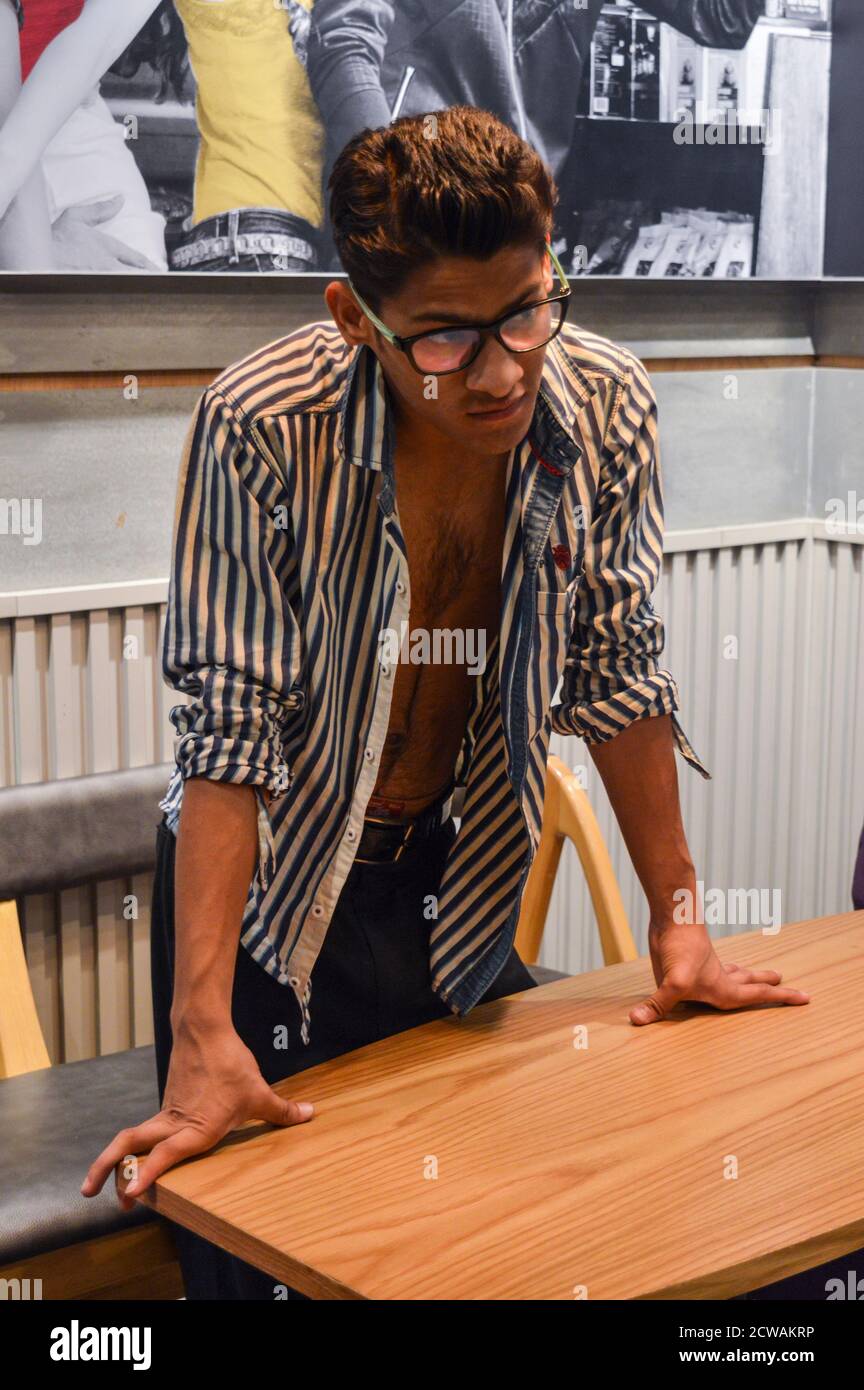 Indian boys giving poses for fashion photo shoot on studio with using ...