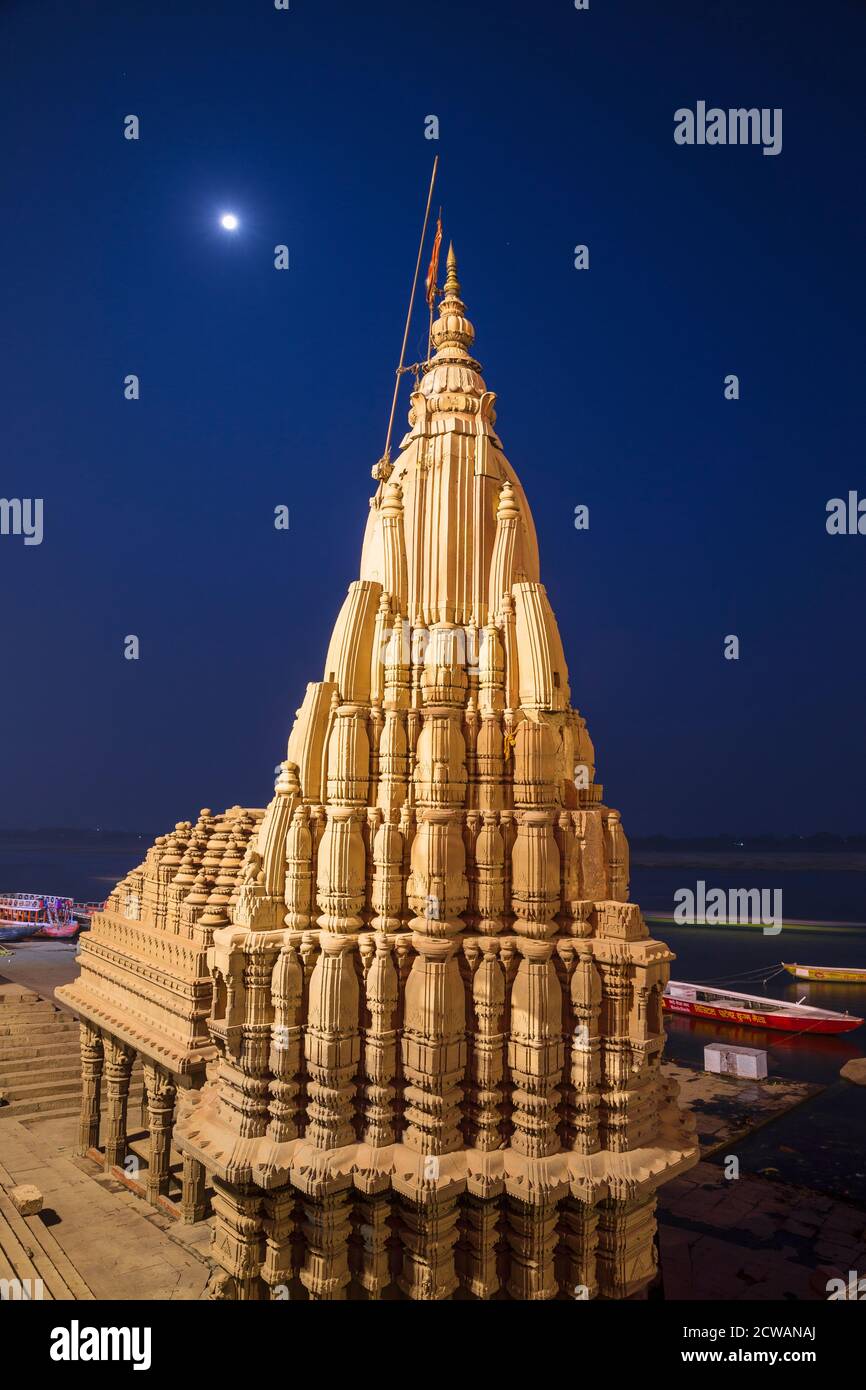 India, Uttar Pradesh, Varanasi, Sindhia Ghat, Submerged Shiva temple ...