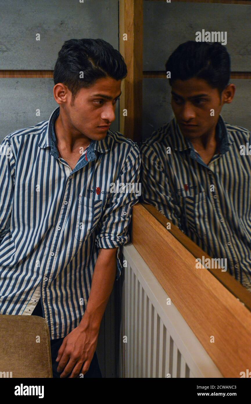 Indian boys giving poses for fashion photo shoot on studio with using ...