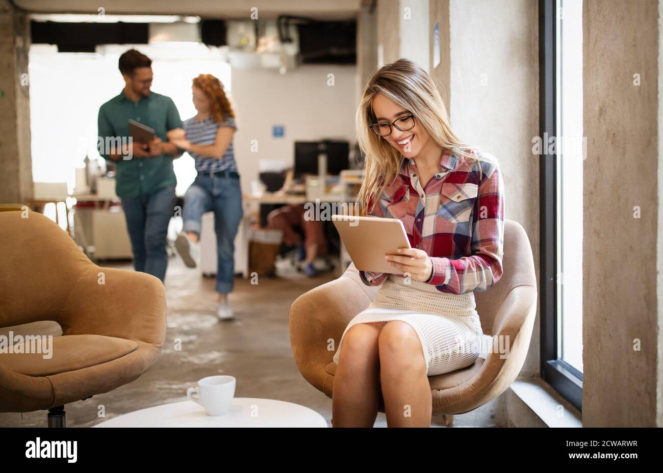 Happy creative team in office. Business, startup, design, people and ...