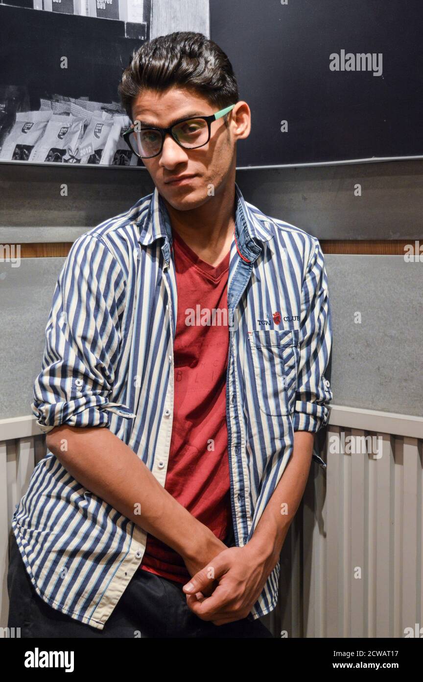 Indian boys giving poses for fashion photo shoot on studio with using ...