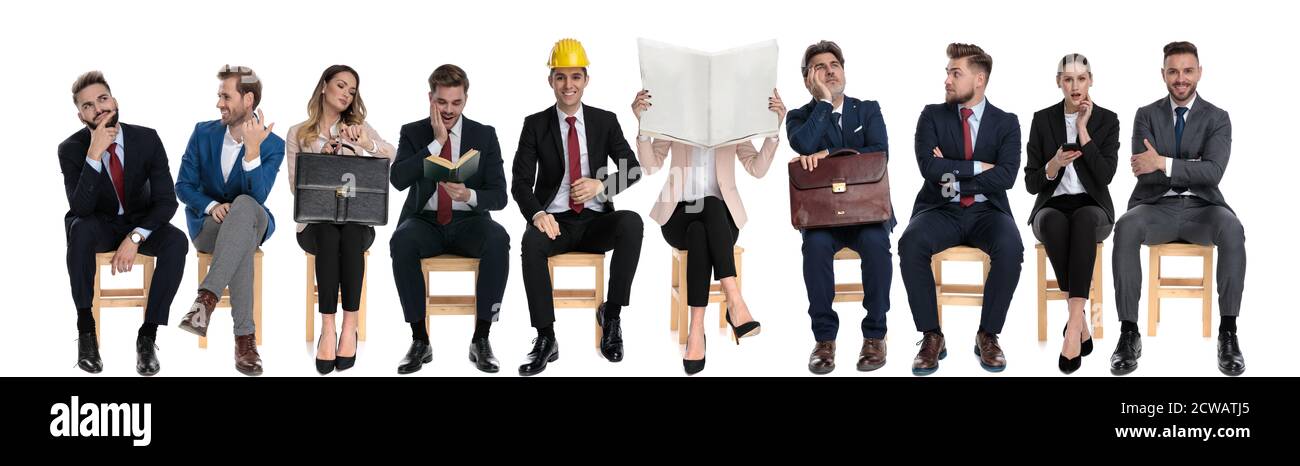 Interview newspaper seated reading hi-res stock photography and images ...