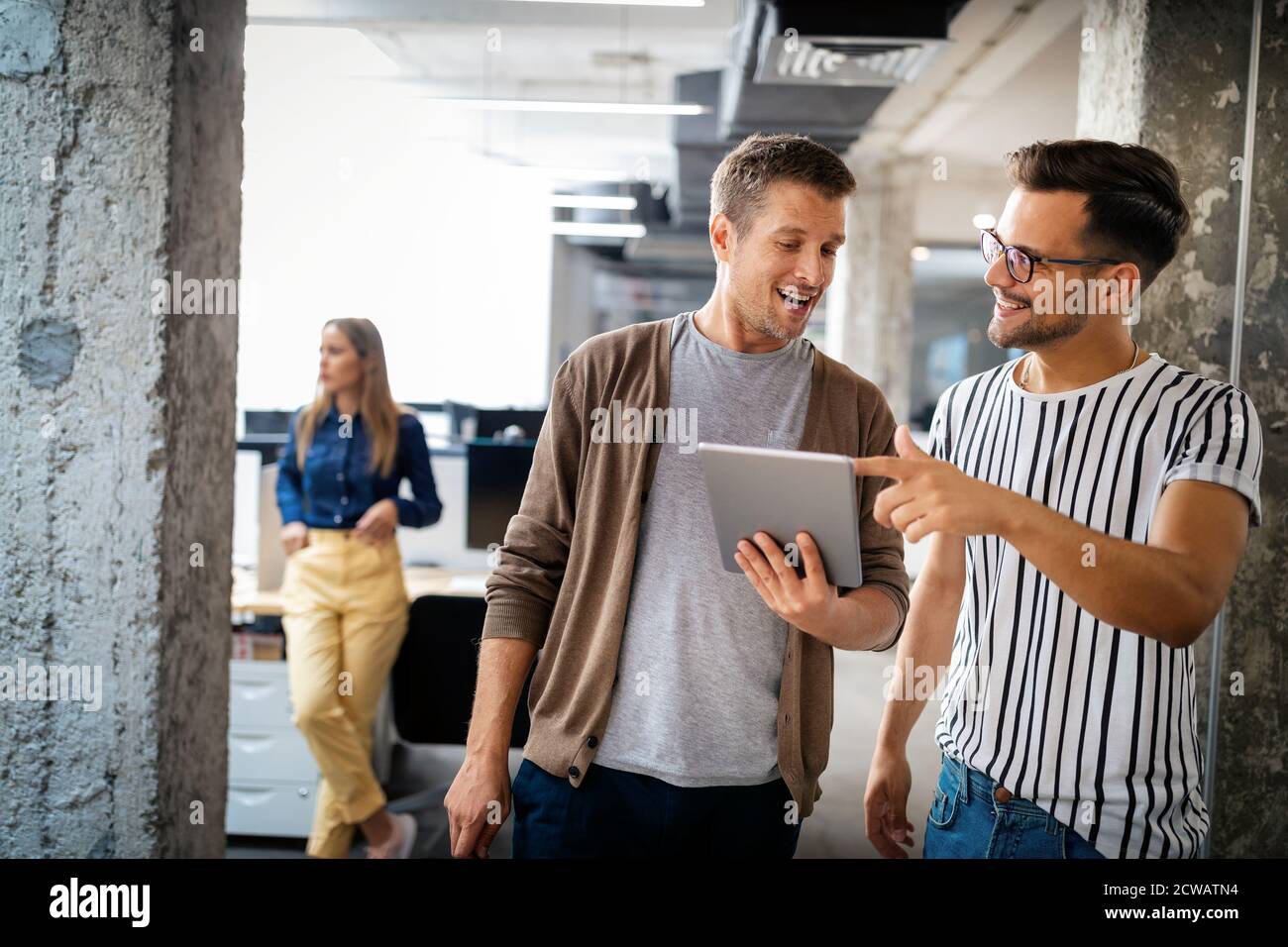 Happy creative team in office. Business, startup, design, people and ...