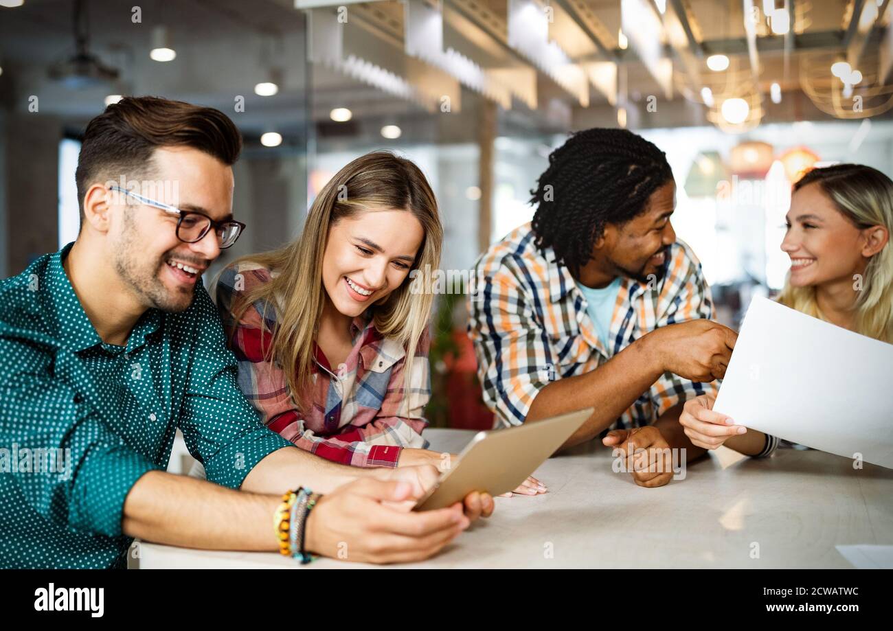 Business people having fun and chatting at workplace office Stock Photo ...