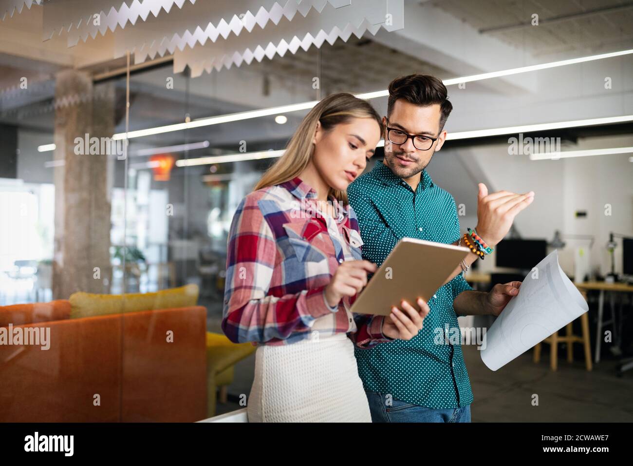 Happy creative team in office. Business, startup, design, people and ...