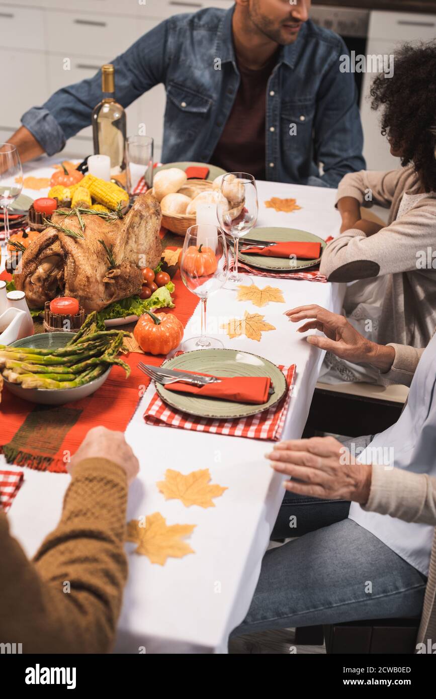 Black family at dinner table hi-res stock photography and images - Alamy