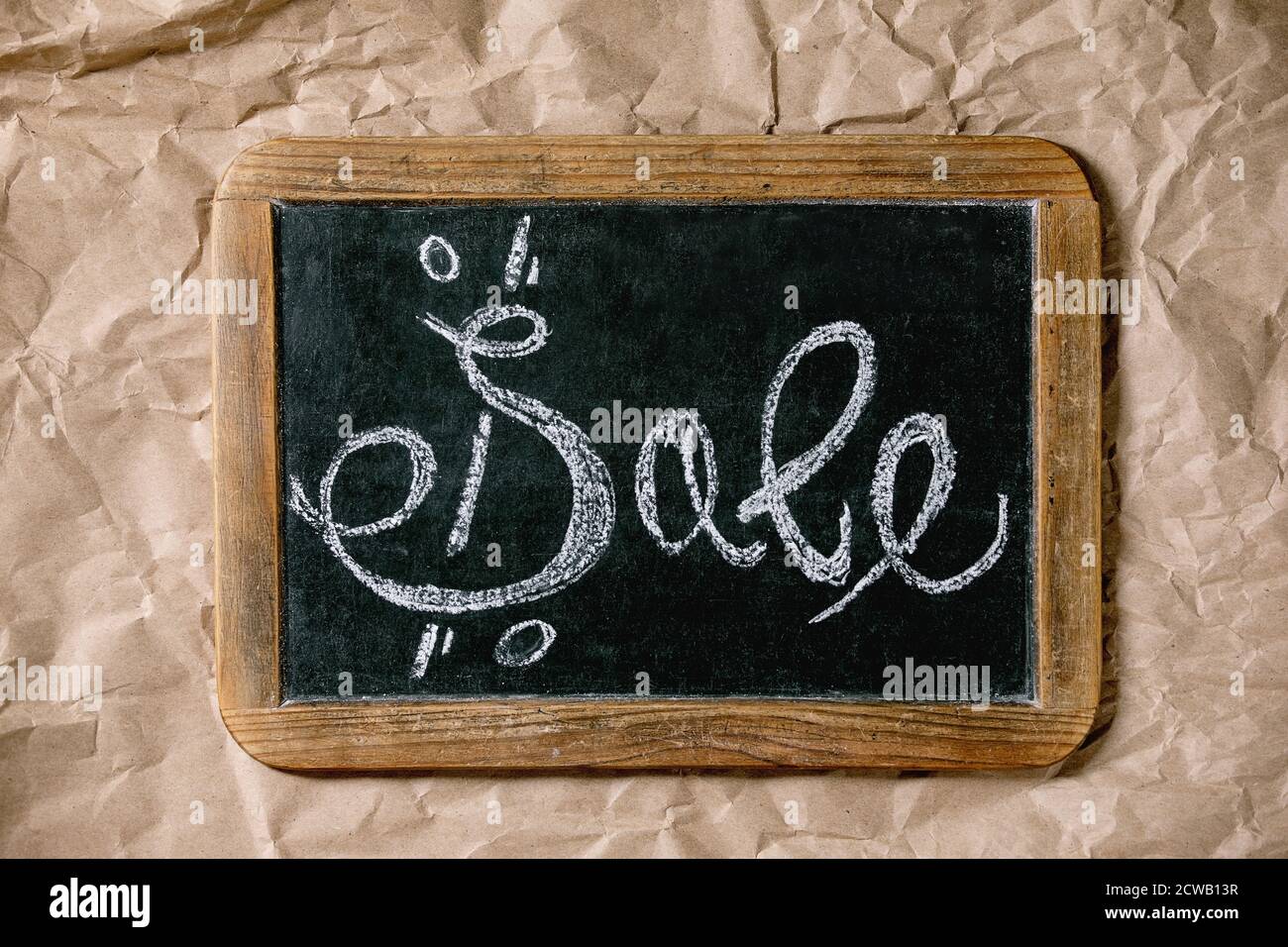 Promotion sale concept. Vintage chalkboard with hand written chalk ...