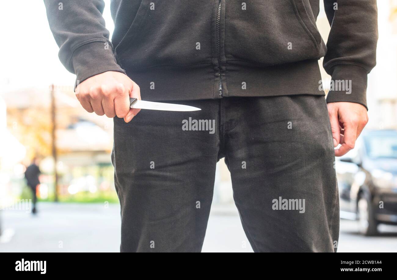 an attacker with a knife violent attacking with a knife Stock Photo - Alamy