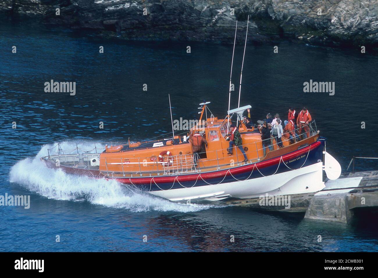 RNLB JOSEPH SOAR, St.DAVID'S LIFEBOAT BEING LAUNCHED DOWN THE SLIPWAY ...