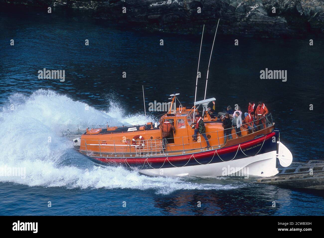 RNLB JOSEPH SOAR, St.DAVID'S LIFEBOAT BEING LAUNCHED DOWN THE SLIPWAY ...