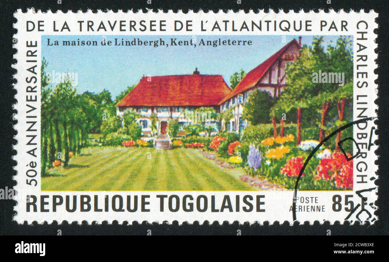 TOGO - CIRCA 1977: stamp printed by Togo, shows Lindbergh home in ...