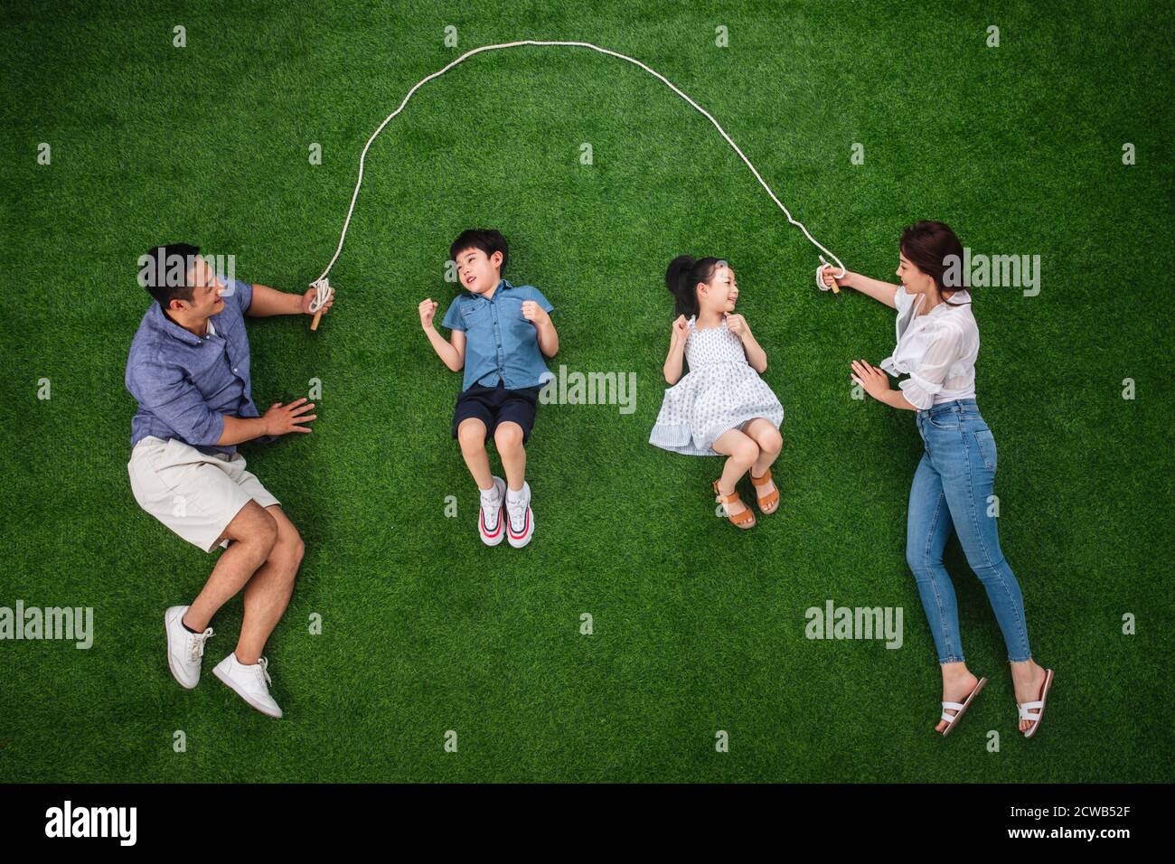 Children jumping rope hi-res stock photography and images - Alamy