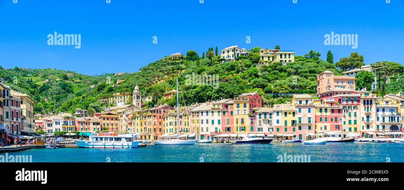 Portofino, Italy - Harbor town with colorful houses and yacht in little ...