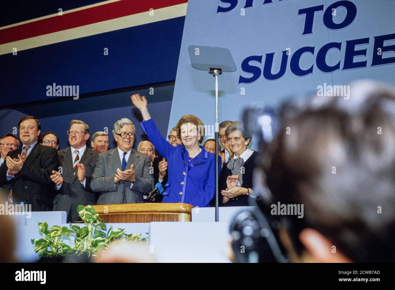 The Rt Hon Margaret Thatcher MP, The Prime Minister, acknowledges the ...