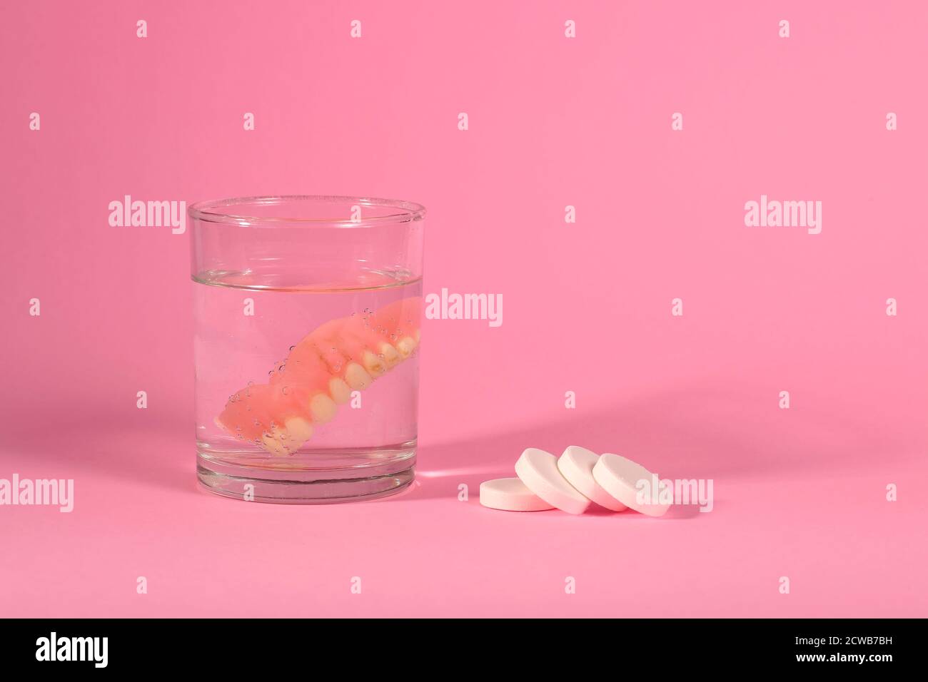 cleaning false teeth Stock Photo - Alamy