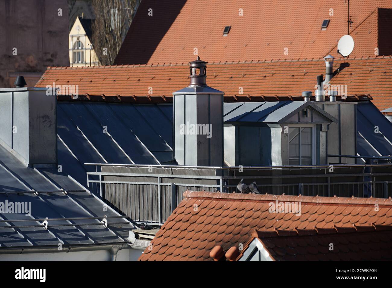 Modern houses with red clay tiles in Germany Stock Photo - Alamy