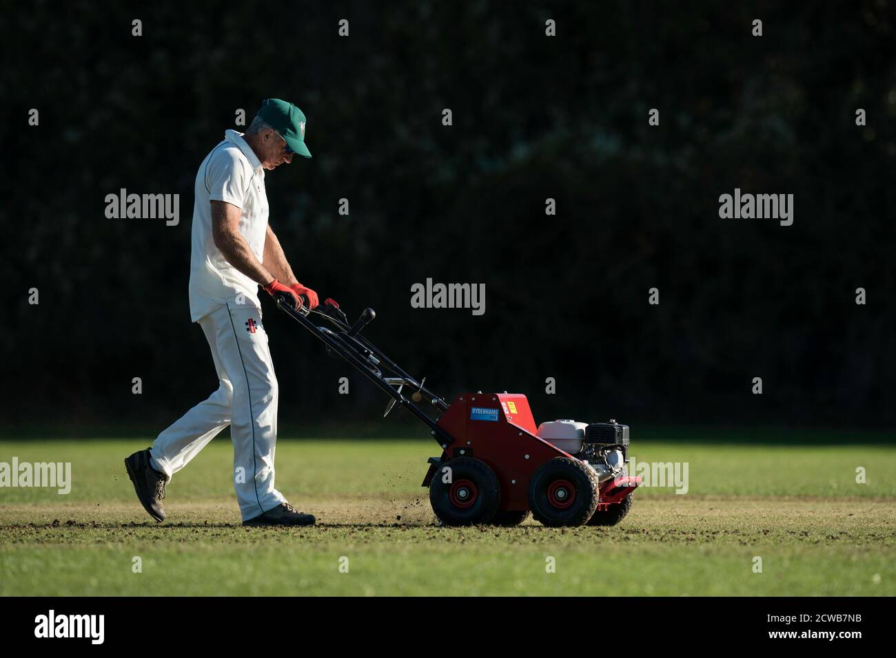 Scarifying pitch after last game of the season Stock Photo - Alamy