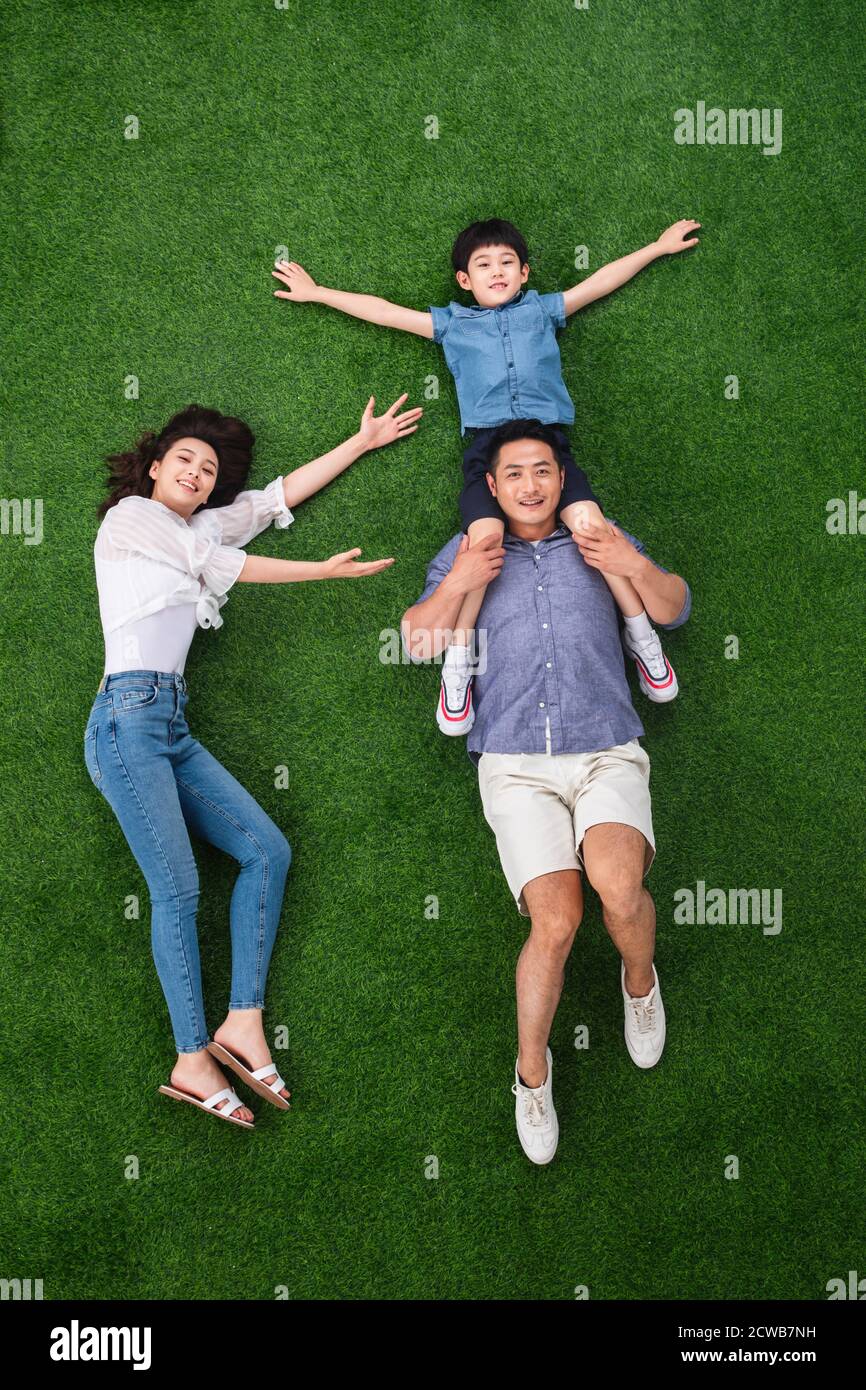 The happiness of a family of three Stock Photo - Alamy