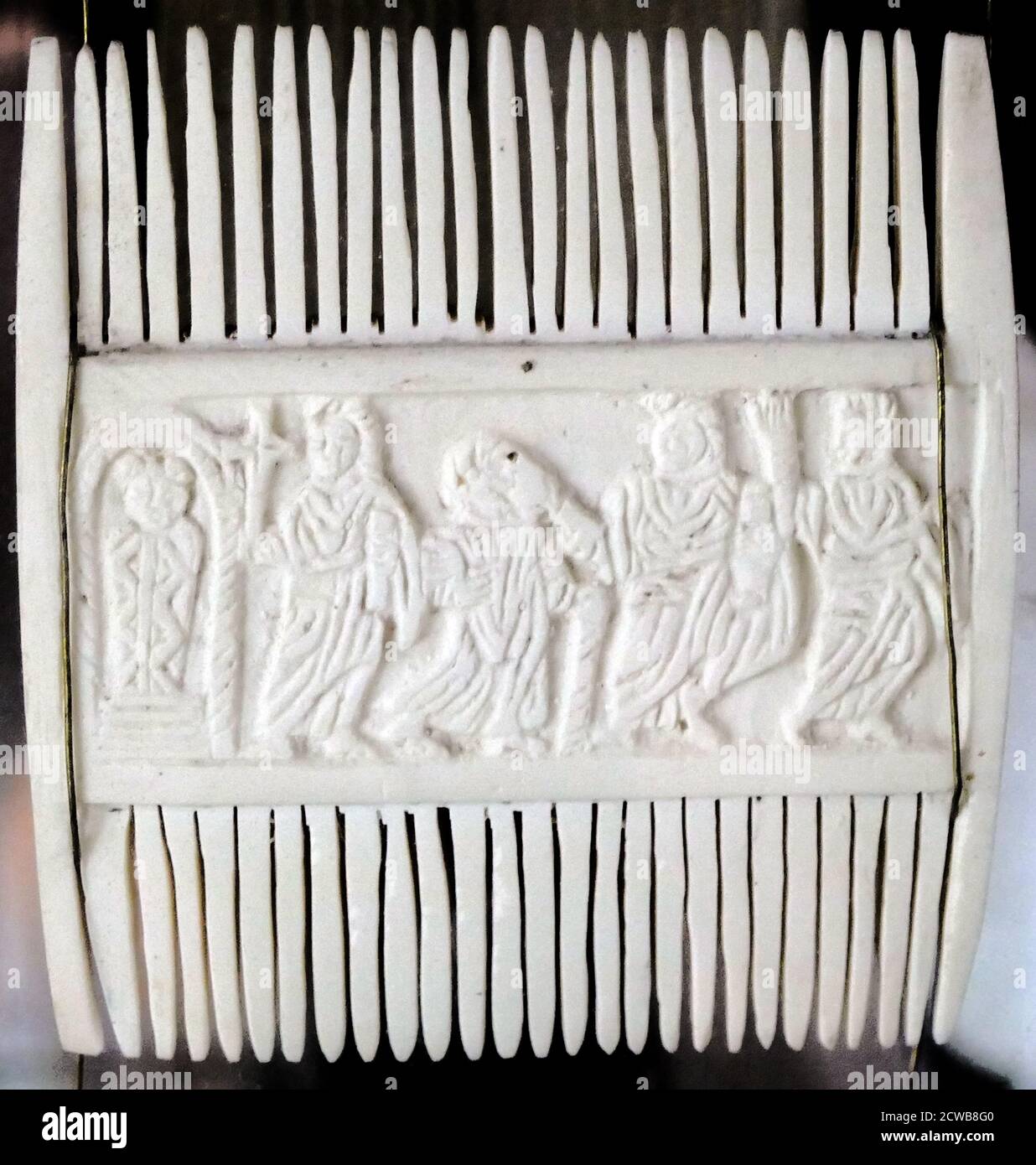 Ivory comb engraved with a scene representing the miracle of healing ...