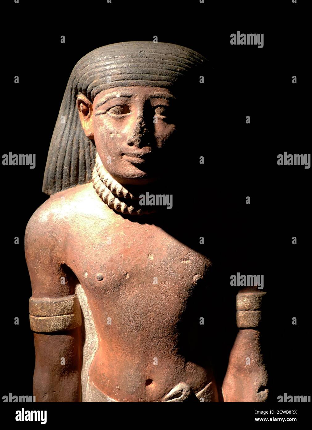 Painted sandstone statue depicting an official wearing the gold of ...