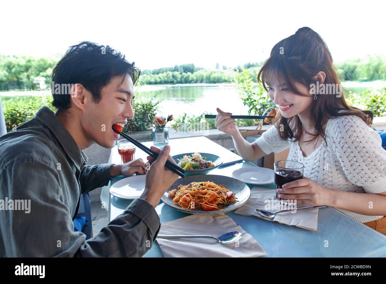 Two couples eating meal hi-res stock photography and images - Alamy