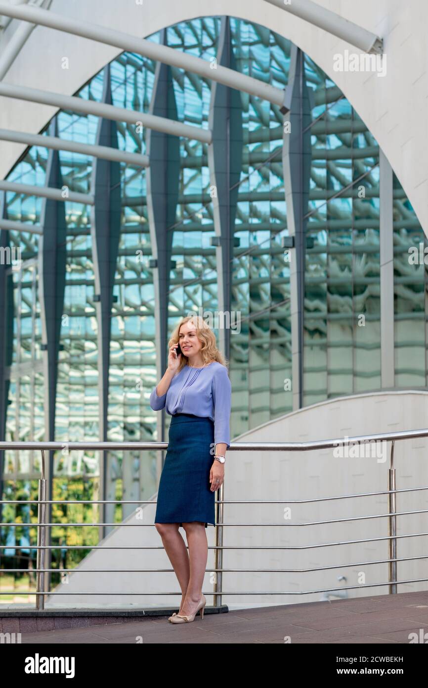 Woman uses smartphone private hi-res stock photography and images - Alamy