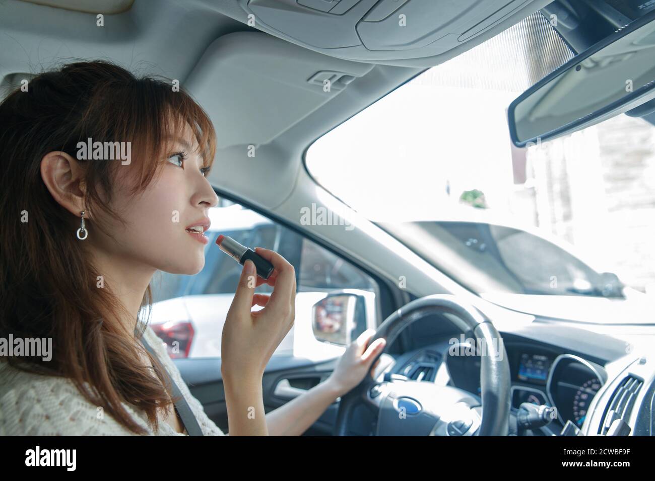 Drive young woman Stock Photo - Alamy