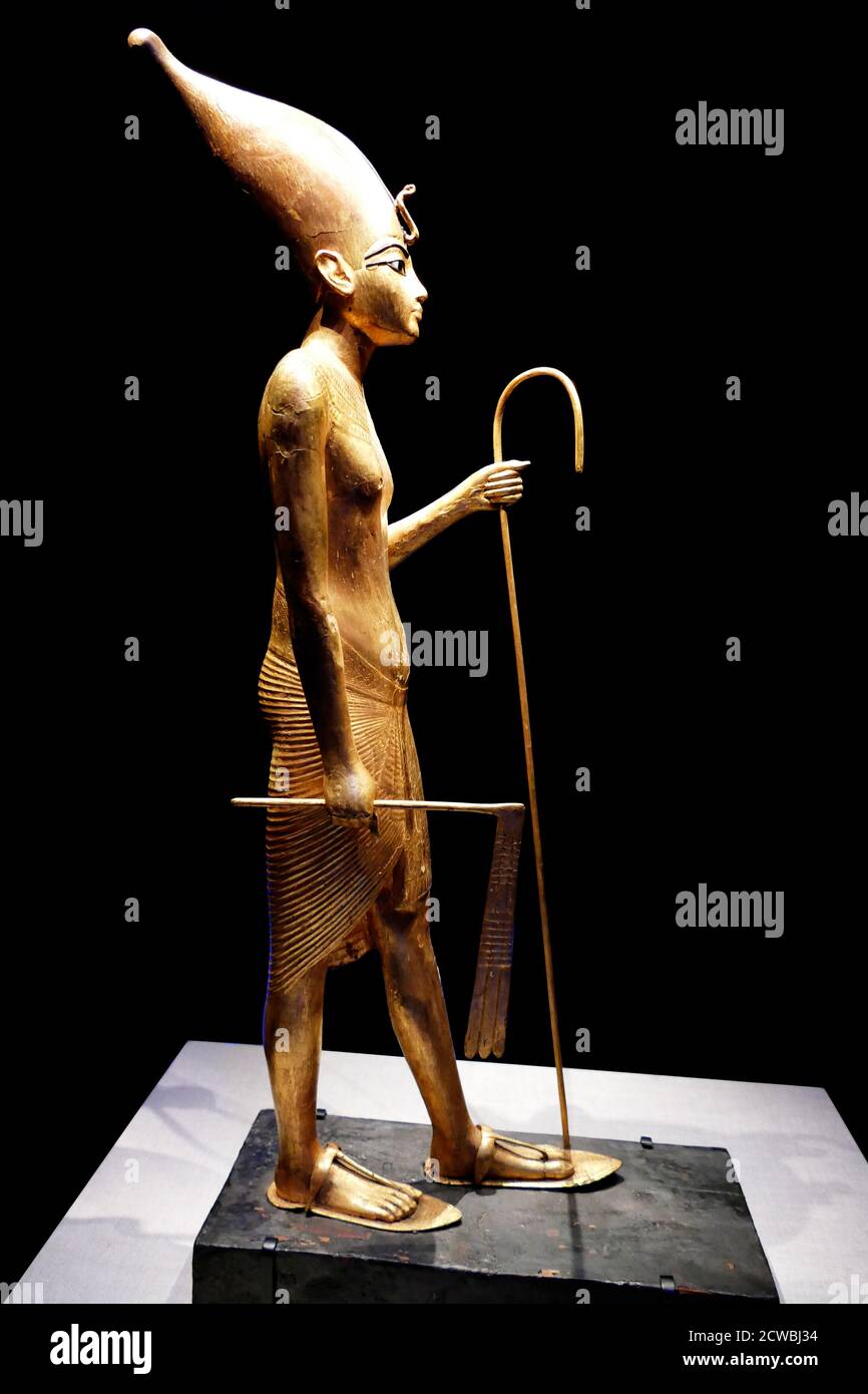 Gilded wooden statue of King Tutankhamun. 1326 BC From the tomb of King ...