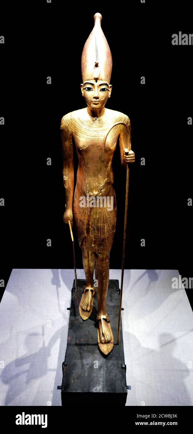 Gilded wooden statue of King Tutankhamun. 1326 BC From the tomb of King ...