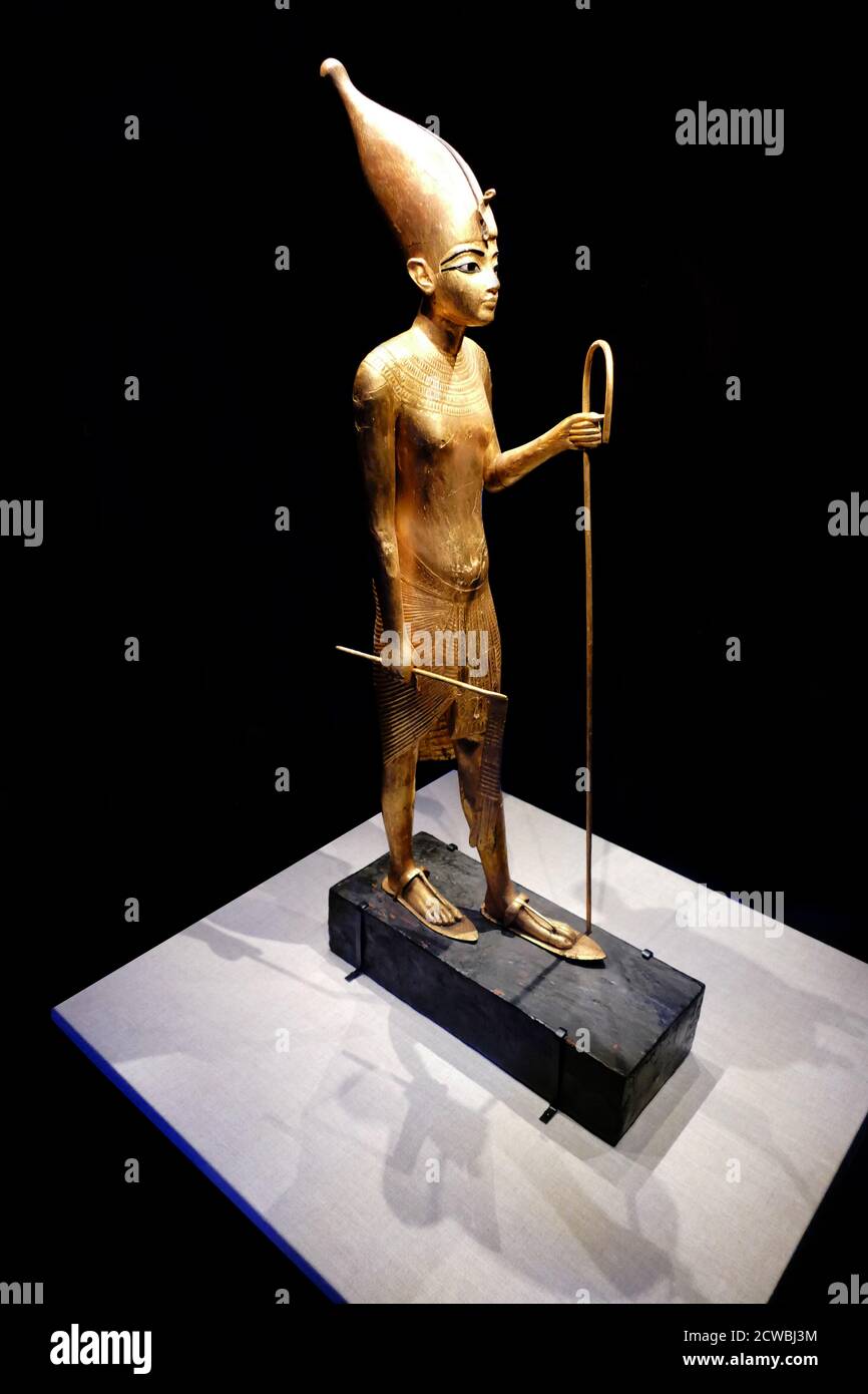 Gilded wooden statue of King Tutankhamun. 1326 BC From the tomb of King ...