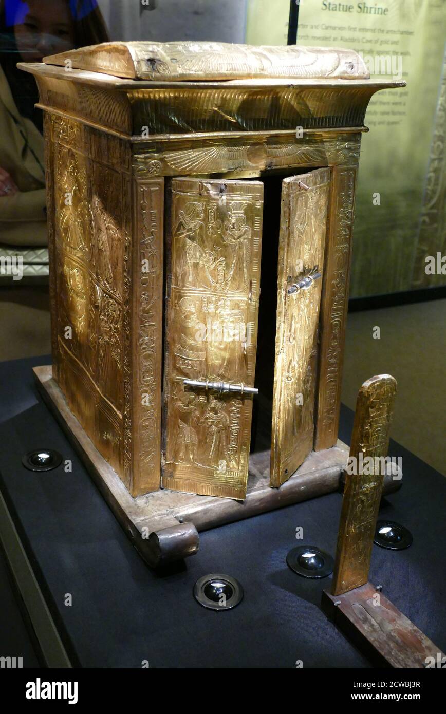 Gilded wooden shrine with depictions of Tutankhamun and Ankhesenamun ...
