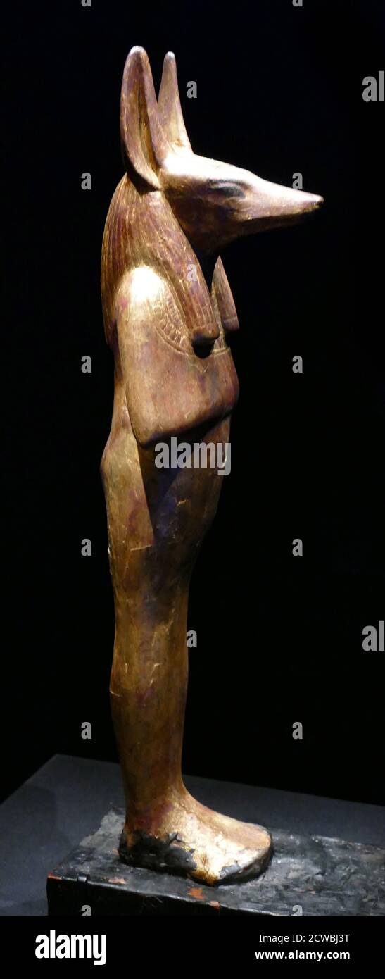 Gilded wooden statues of Herwer (Horus the elder) and Jackal headed ...