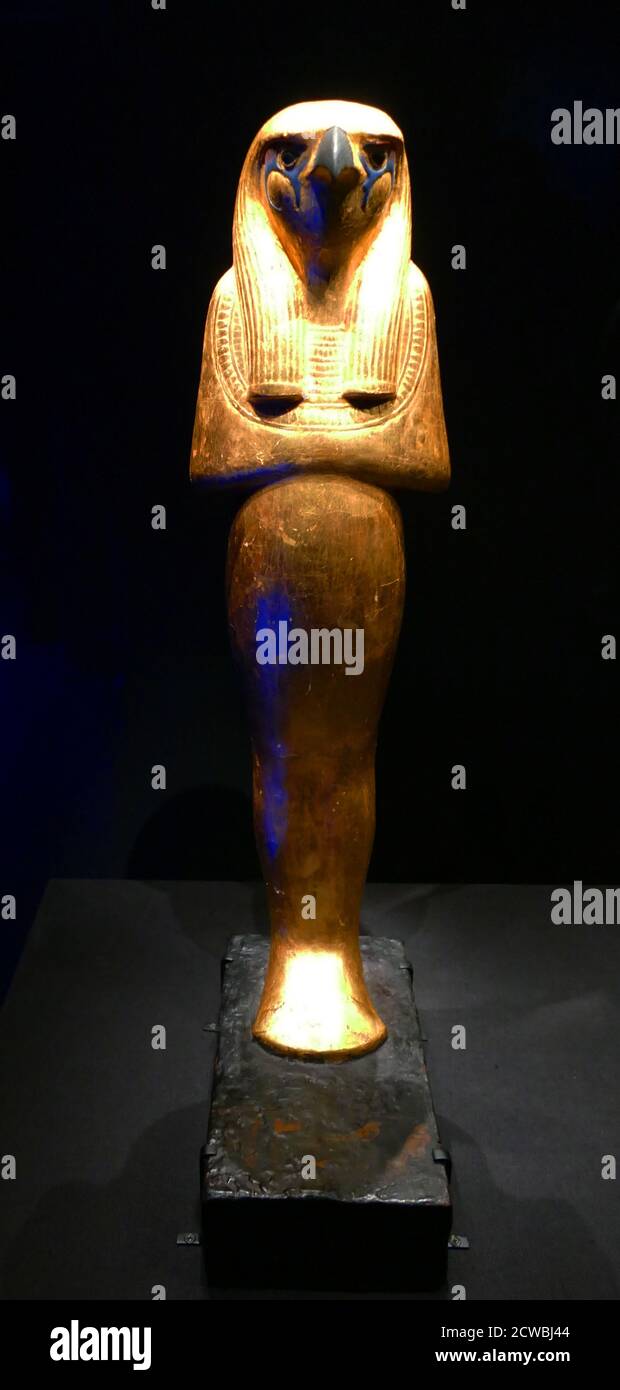 Gilded wooden statue of Herwer (Horus the elder). From the tomb of King ...