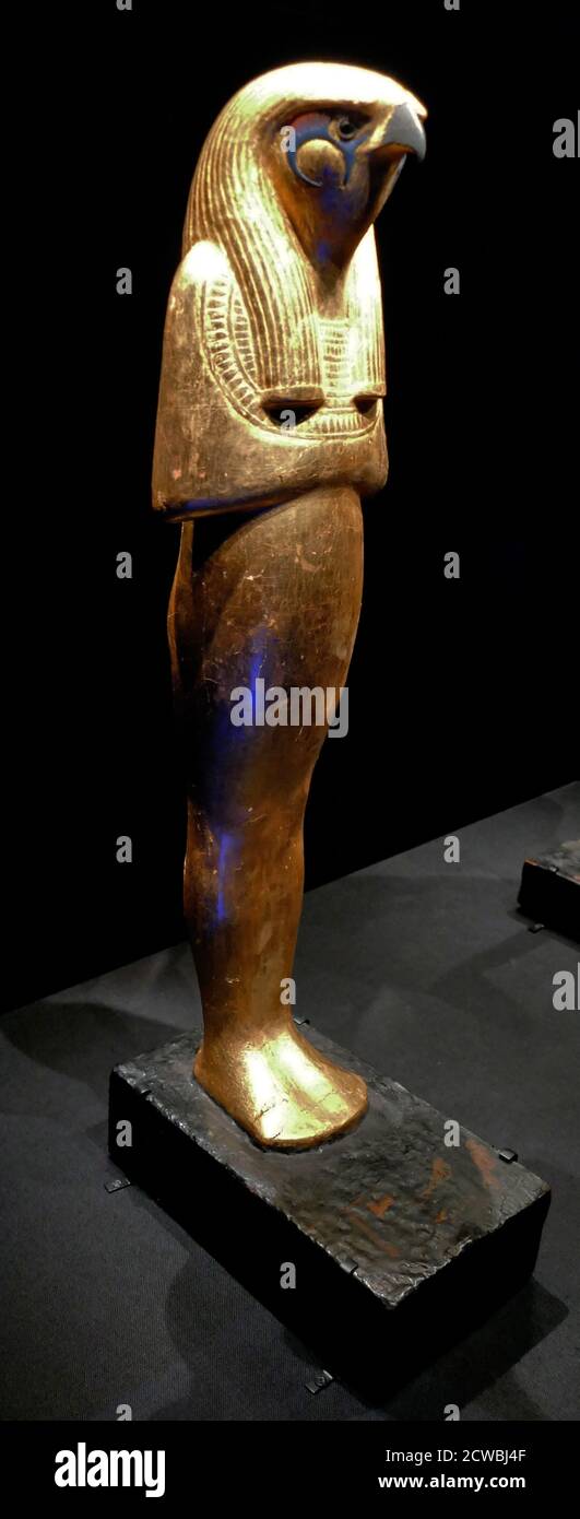 Gilded wooden statue of Herwer (Horus the elder). From the tomb of King ...