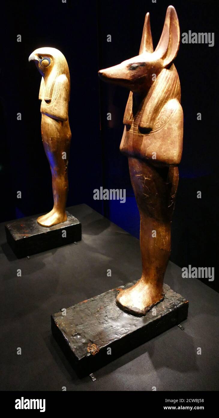Gilded wooden statues of Herwer (Horus the elder) and Jackal headed ...