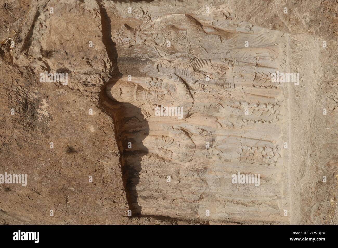 Photograph of Naqsh-e Rostam relief showing the Investiture of Sasanian ...