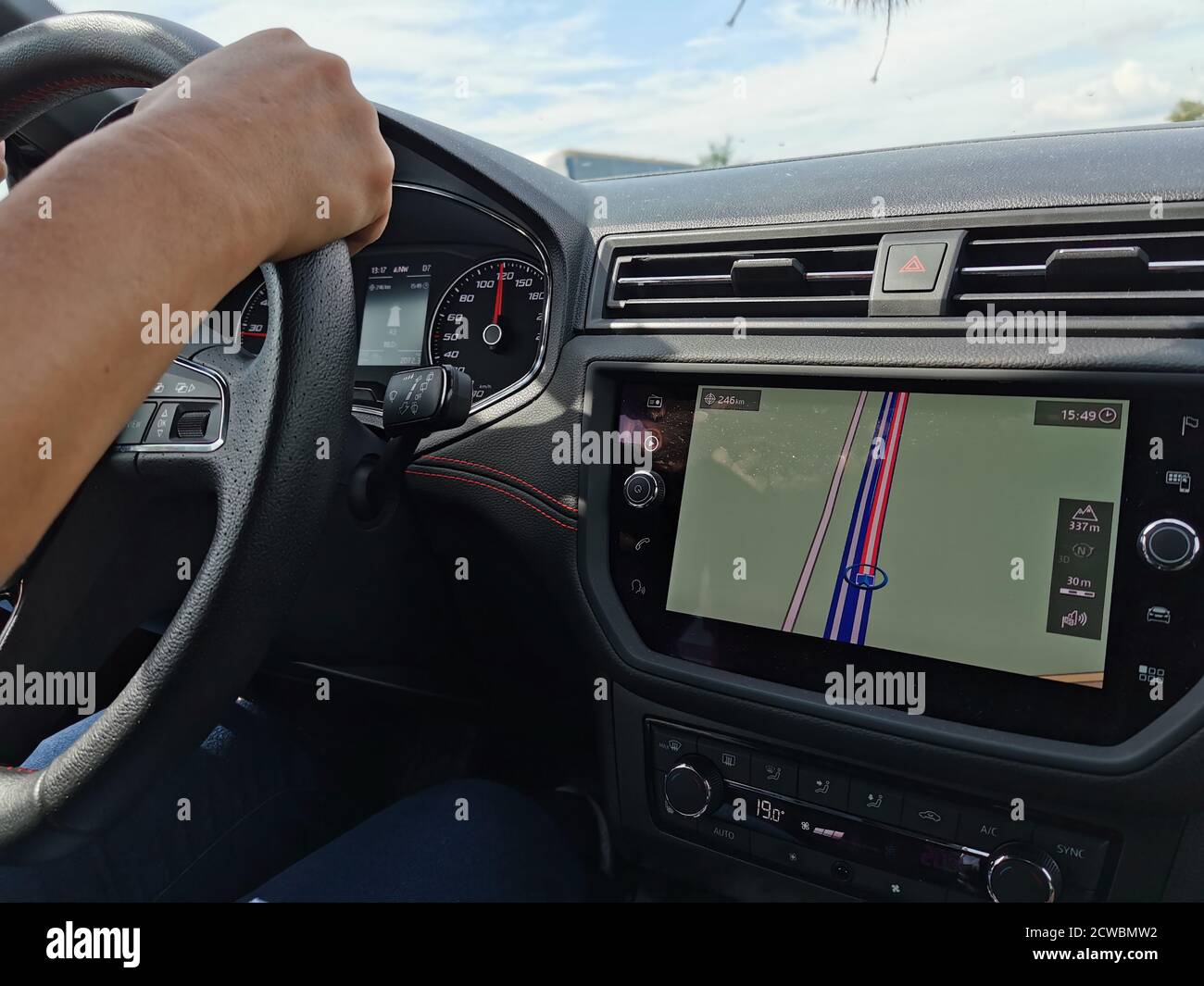 Driver in the car controls the navigator. Close-up part Stock Photo - Alamy
