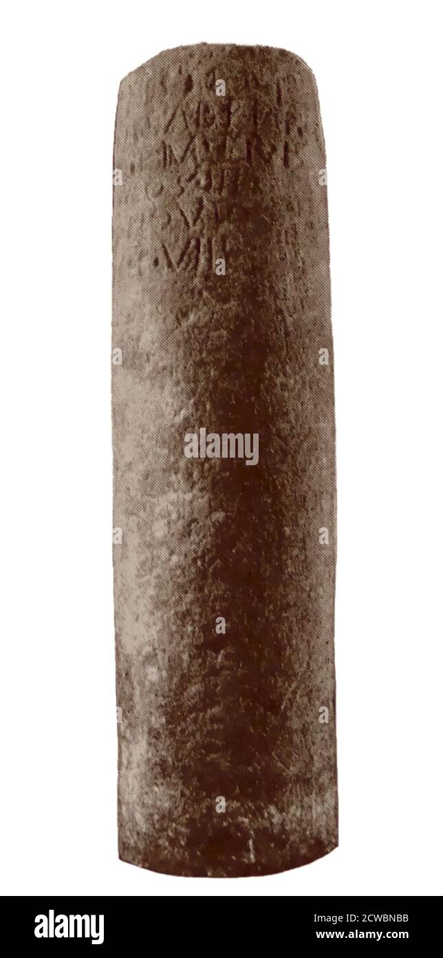 Photograph of a Roman milestone marker placed along a road or boundary ...