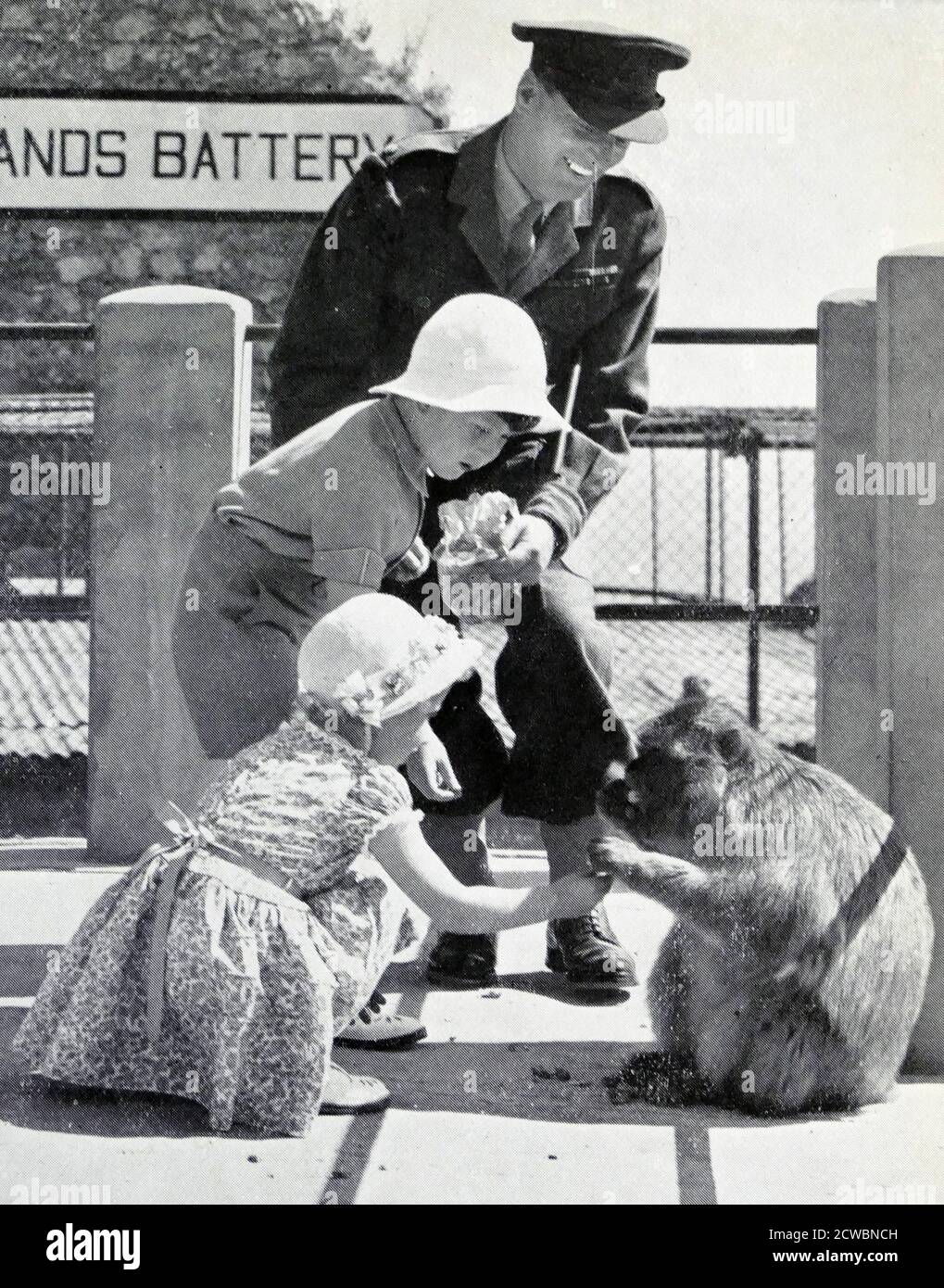 Prince Charles and Princess Anne with a Gibraltar Ape during the visit ...