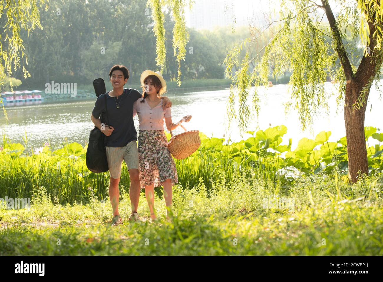 Happy couples in the park for an outing Stock Photo - Alamy