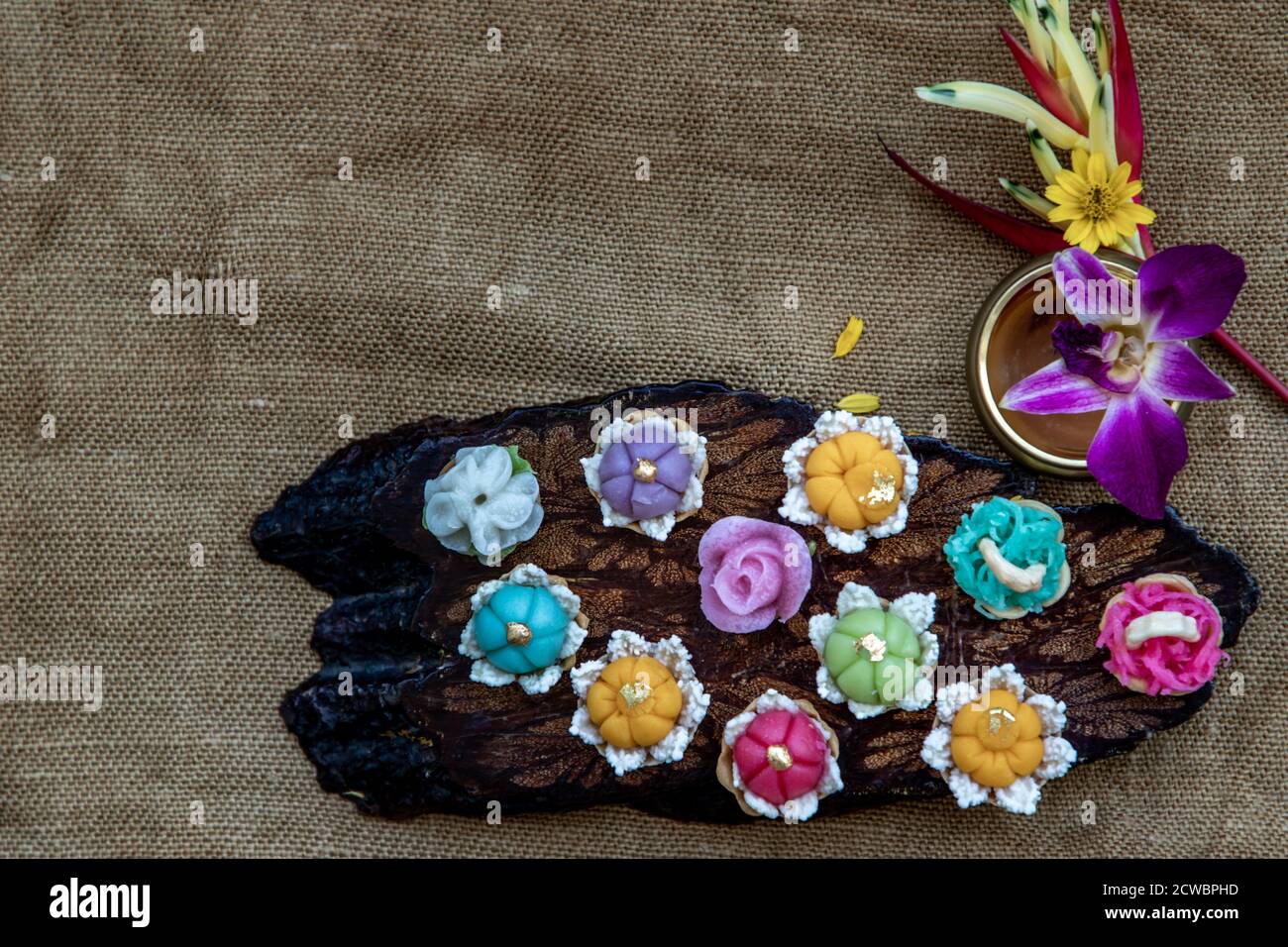 A variety of elegantly beautiful Thai Desserts (Khanom Wan Thai) colorful variations serving in ...