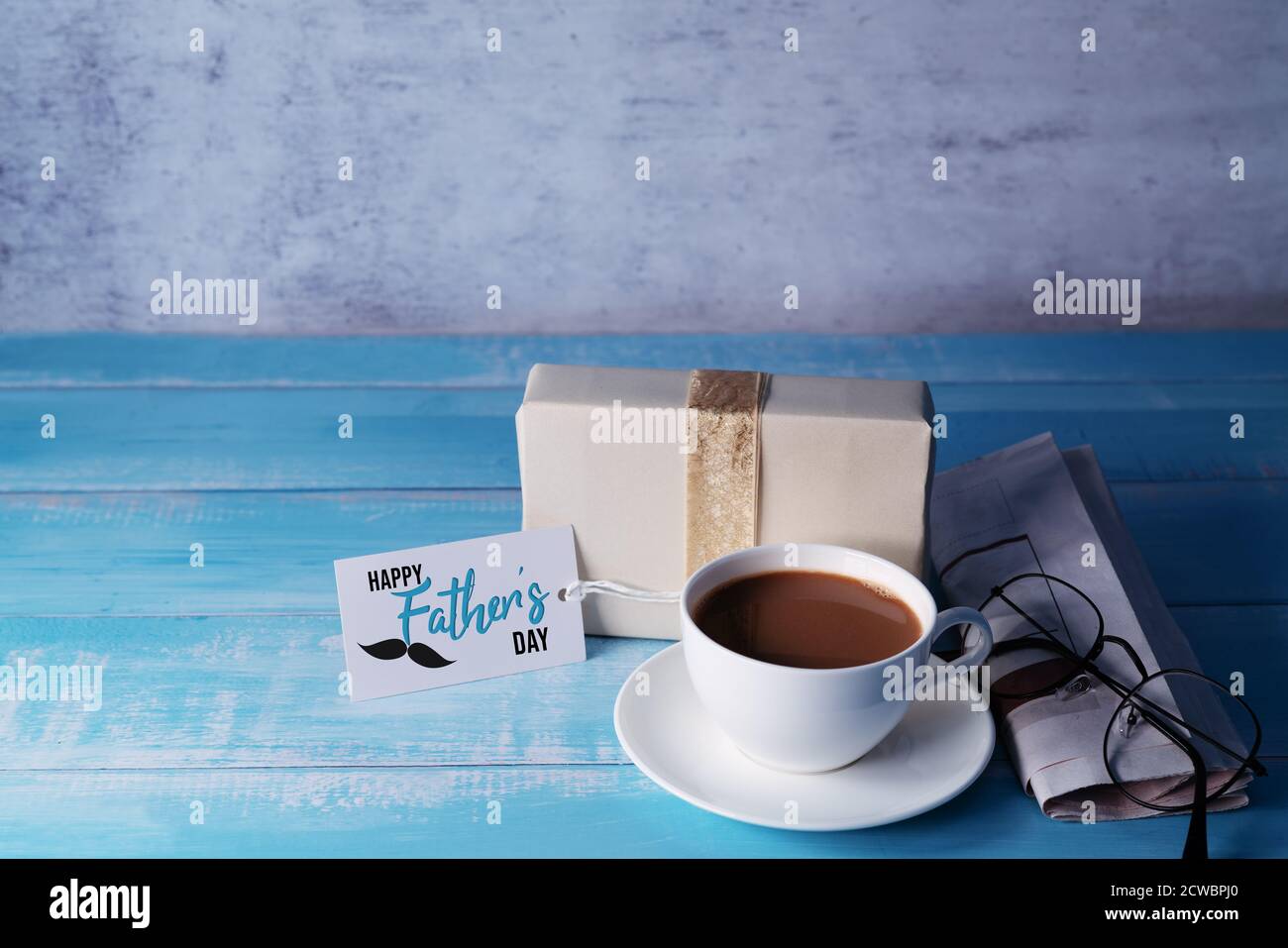 Happy Fathers Day, a cup of coffee with gift box and eyeglasses Stock ...